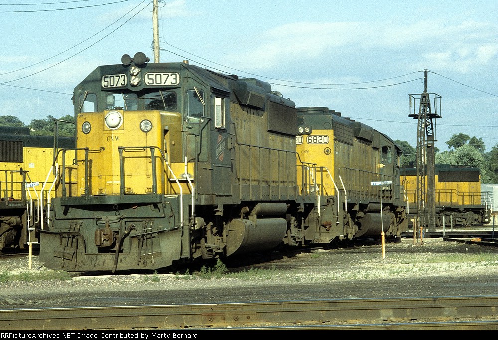 C&NW 5073 and 6820 Wait on a Track Radiating from the Turntable